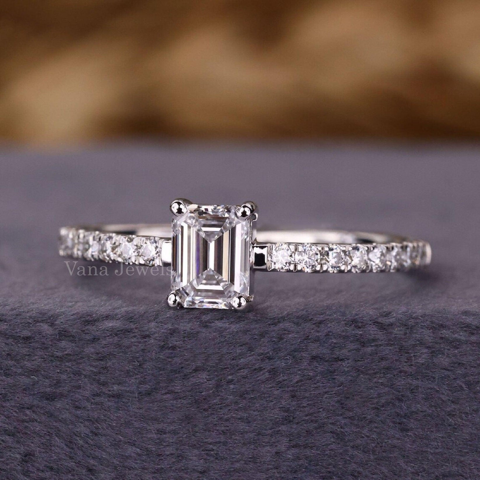 This Lab Grown Diamond Emerald Cut Engagement Ring Features a Stunning ...